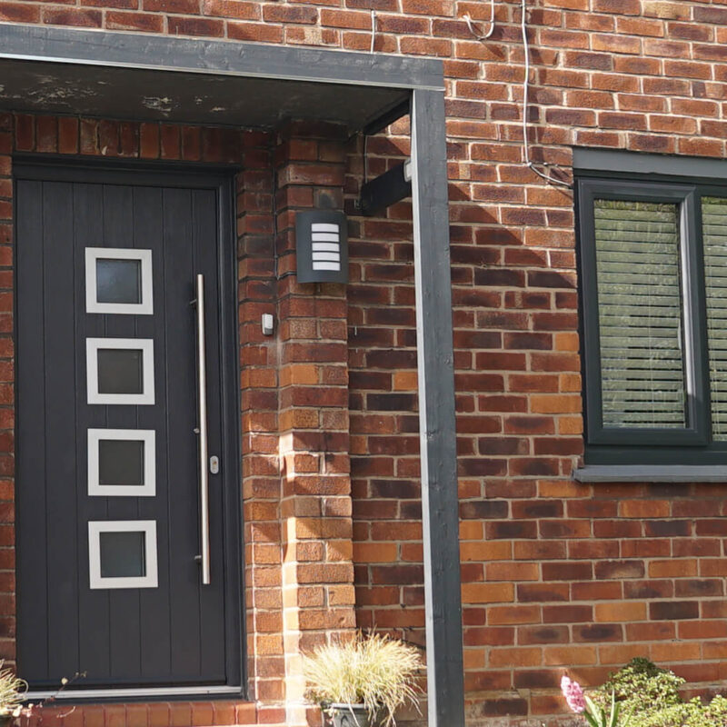 Grey Extreme Windows & Solid Core Front Door | Eden Windows