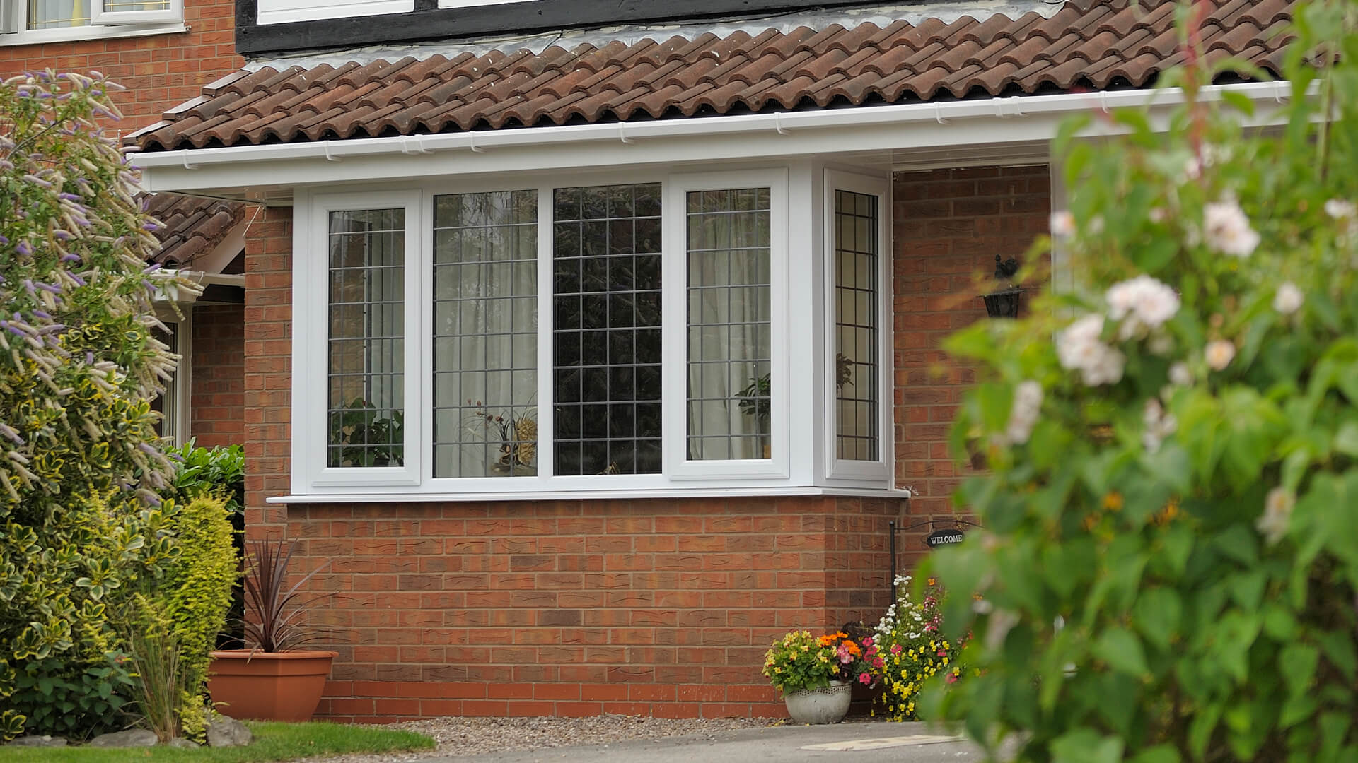 White Leaded UPVC Windows & White Composite Door from Eden